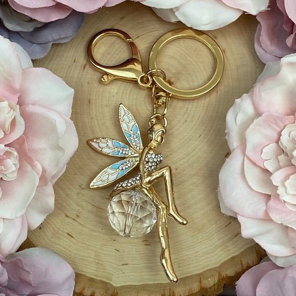 Accessories | Delicate Gold And Pale Blue Fairy Sitting On Crystal ...
